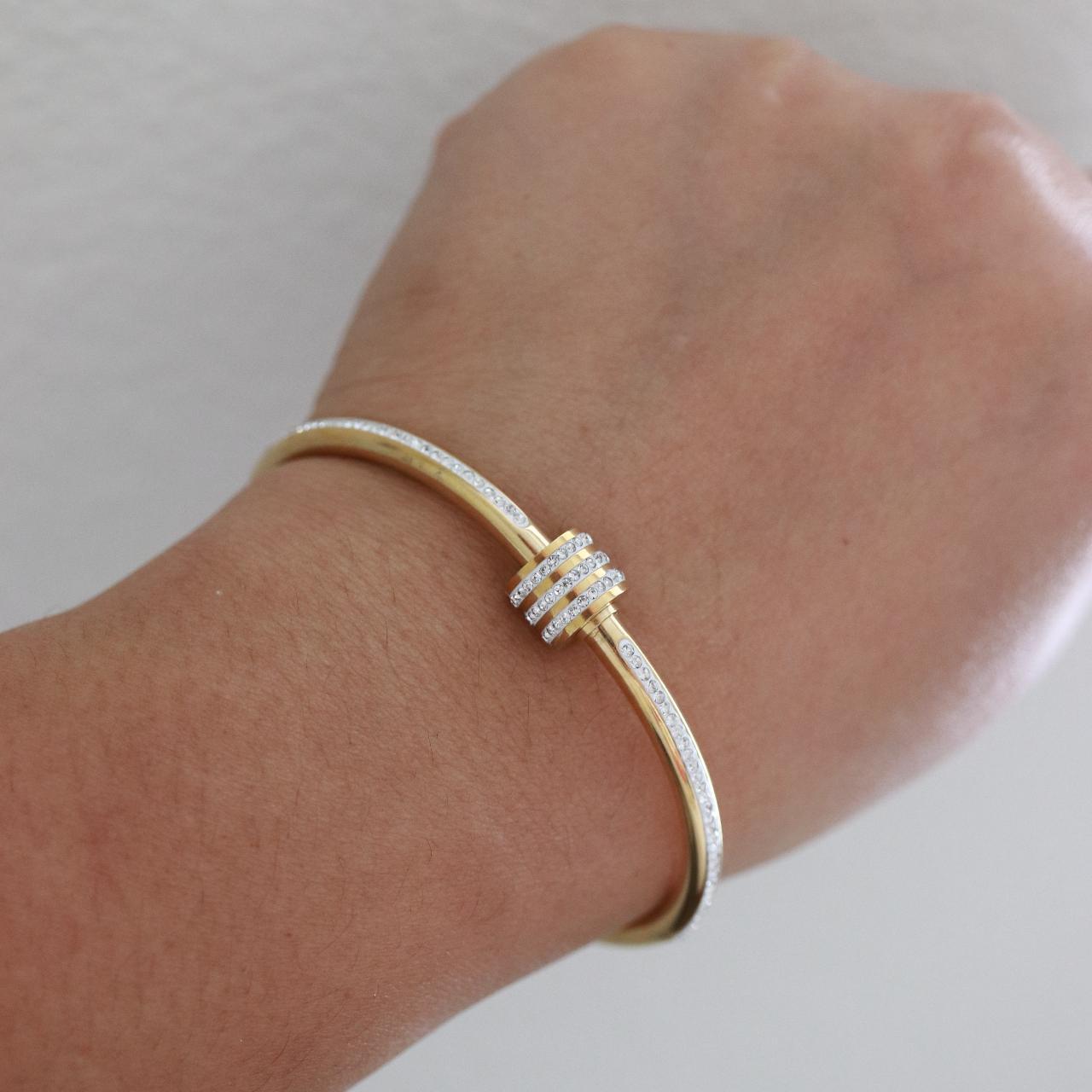 17cm Gold Plated Stainless Steel Lock Ring CZ Bangle... - Depop