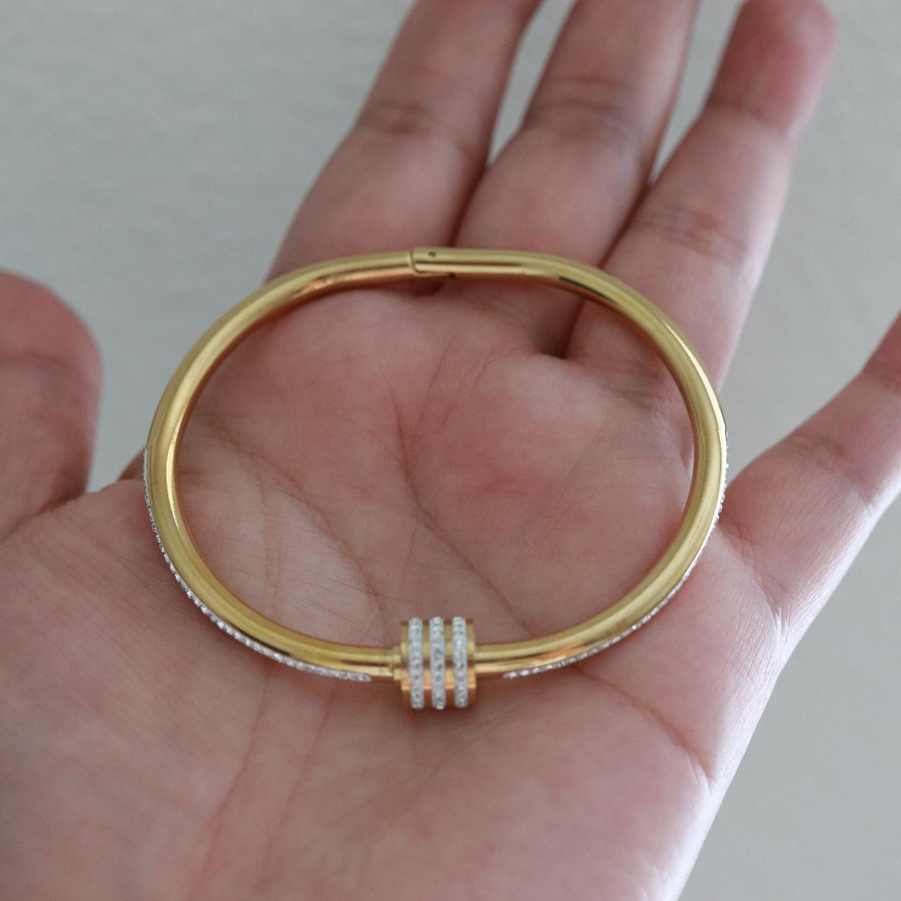 17cm Gold Plated Stainless Steel Lock Ring CZ Bangle... - Depop