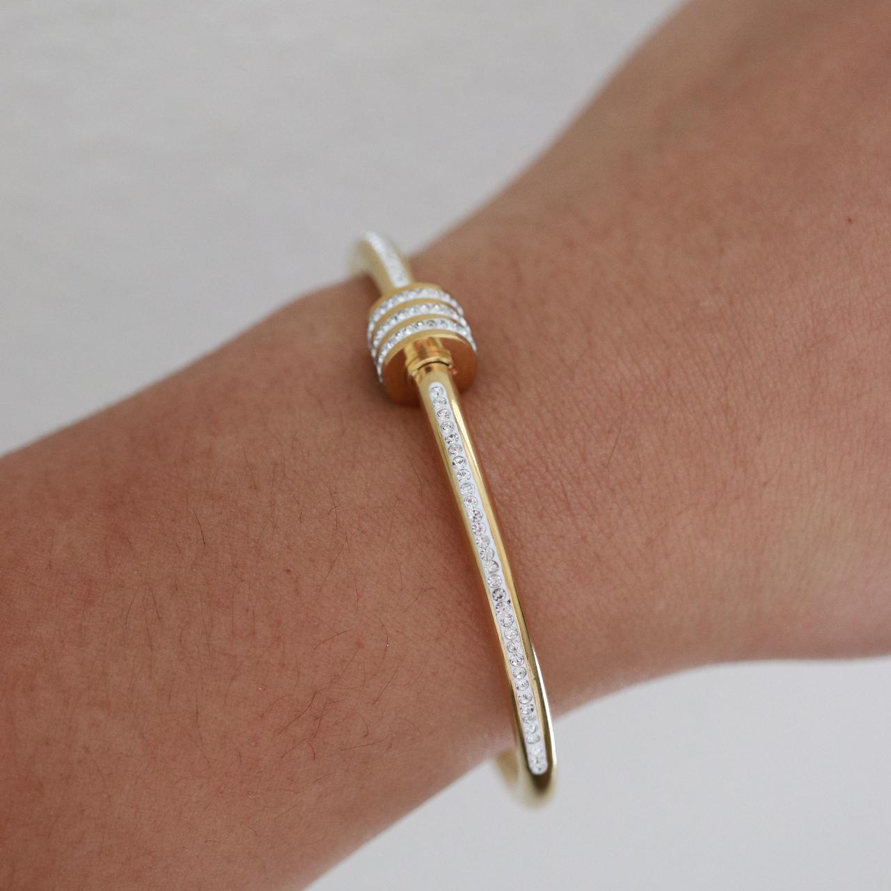 17cm Gold Plated Stainless Steel Lock Ring CZ Bangle... - Depop