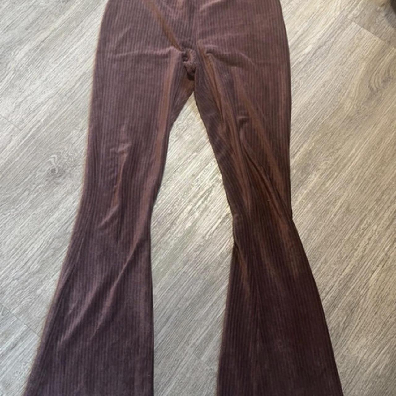 Brown Flared Pants UO Small tear from the middle... - Depop
