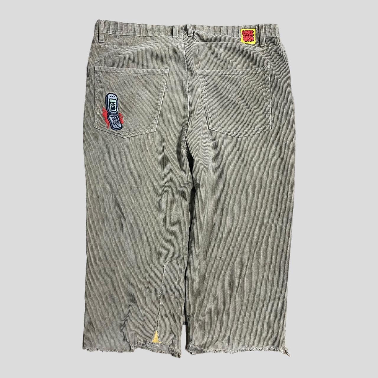 Baggy asf Tan colored Empyres with a cool angry... - Depop