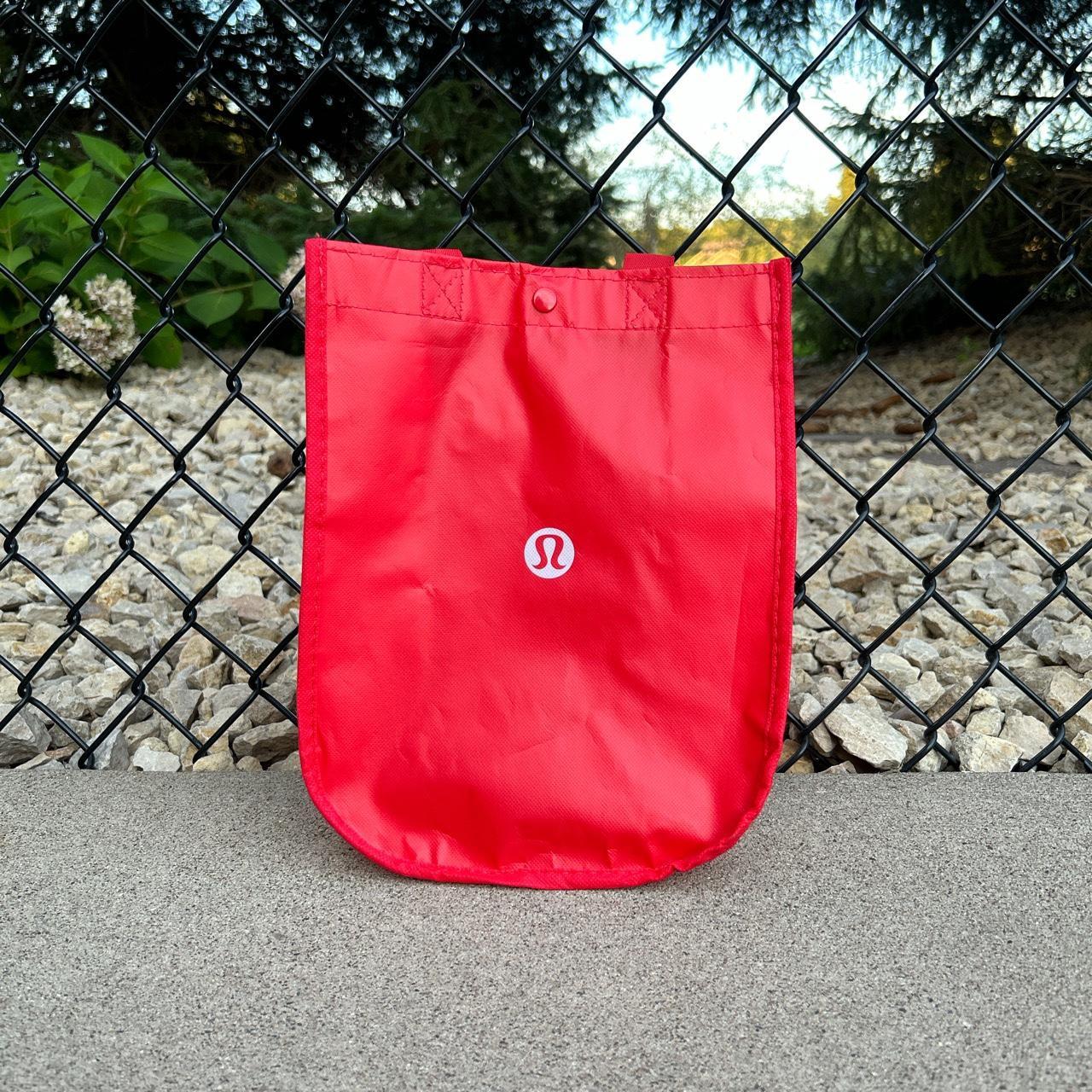 Introducing a Red Lululemon Tote Bag, a versatile... - Depop
