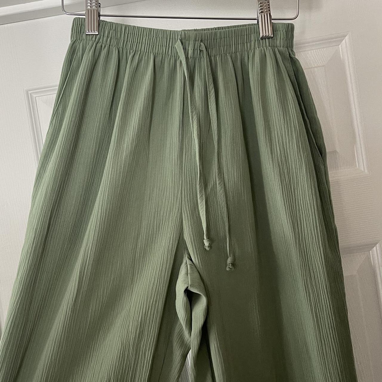 Light green flowy pants Size 10 (runs... - Depop