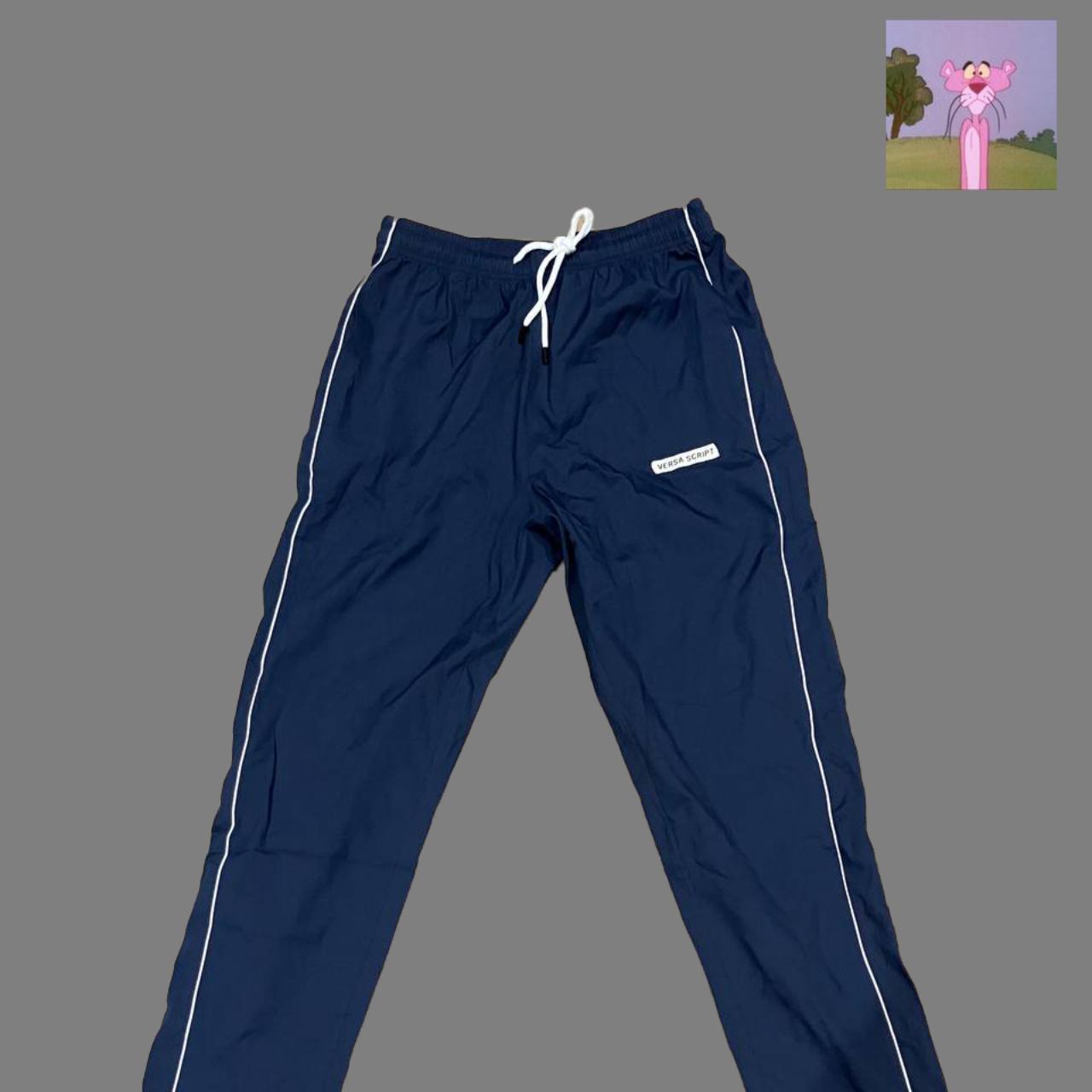 Versa Script Parachute Pants - Depop