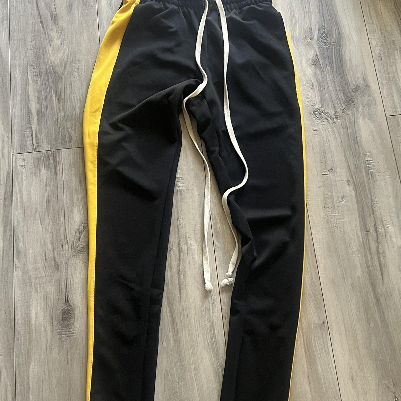 black and yellow eptm track pants #y2k #trackpants... - Depop