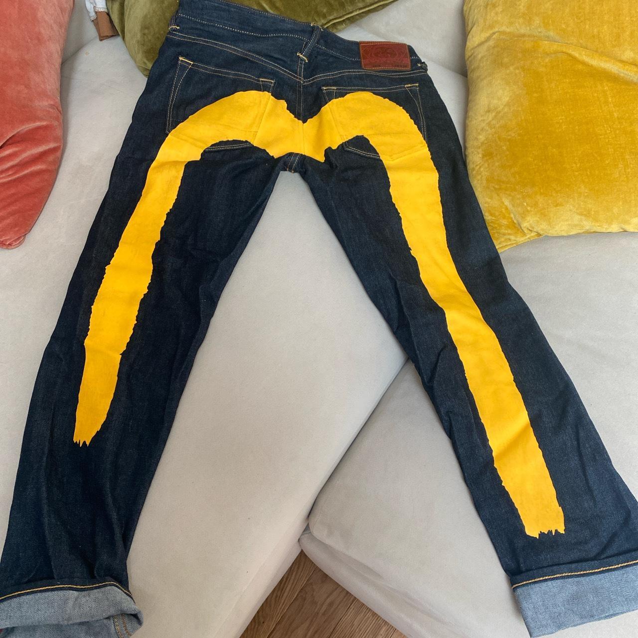 Classic Evisu jeans with yellow... - Depop