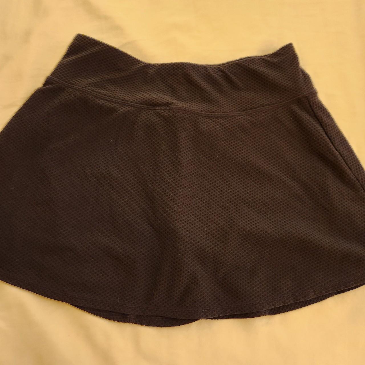 black athletic skort from kyodan shorts underneath... - Depop
