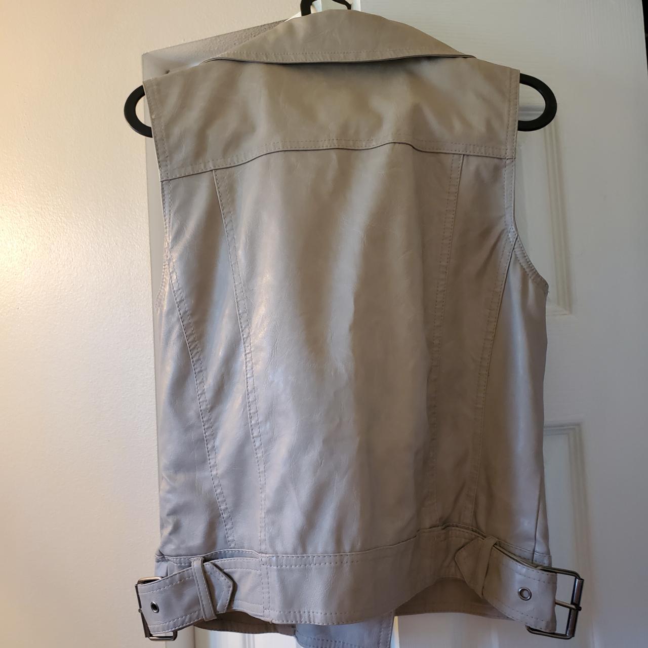 This is an American Rag leather feel vest in a size... - Depop