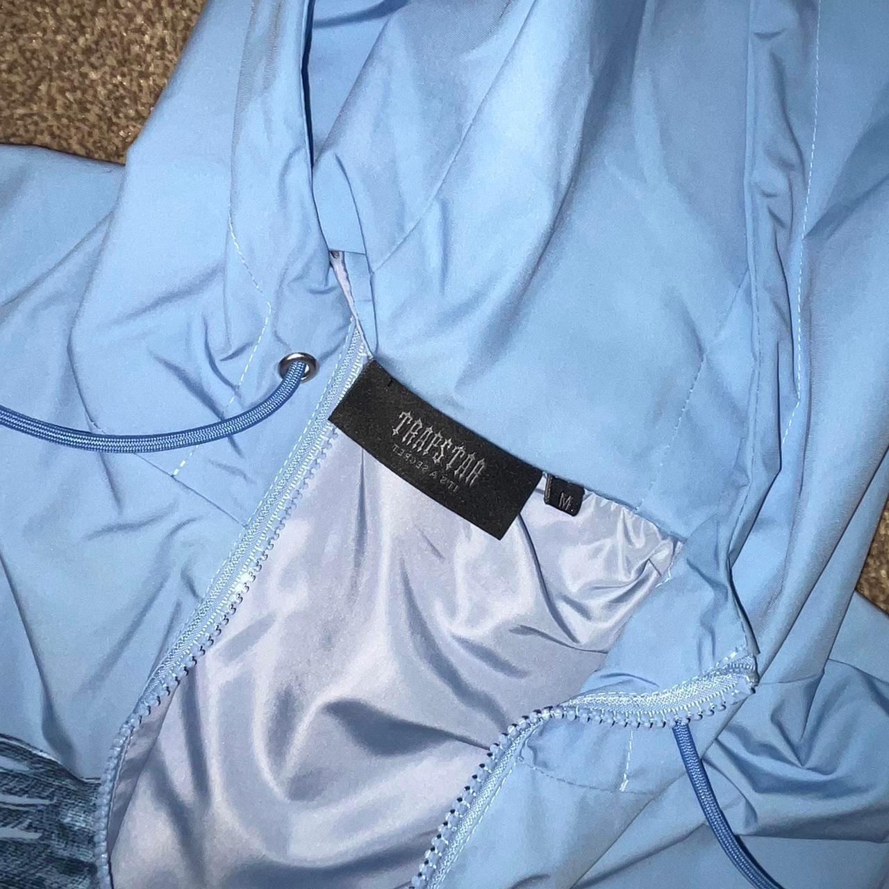 Trapstar eagle windbreaker light blue - Depop