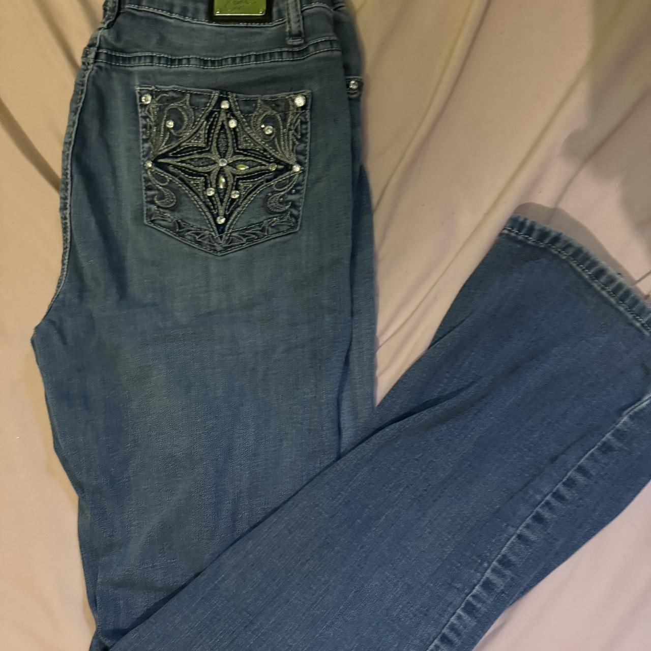 Navy blue low-rise jeans with rhinestone... - Depop