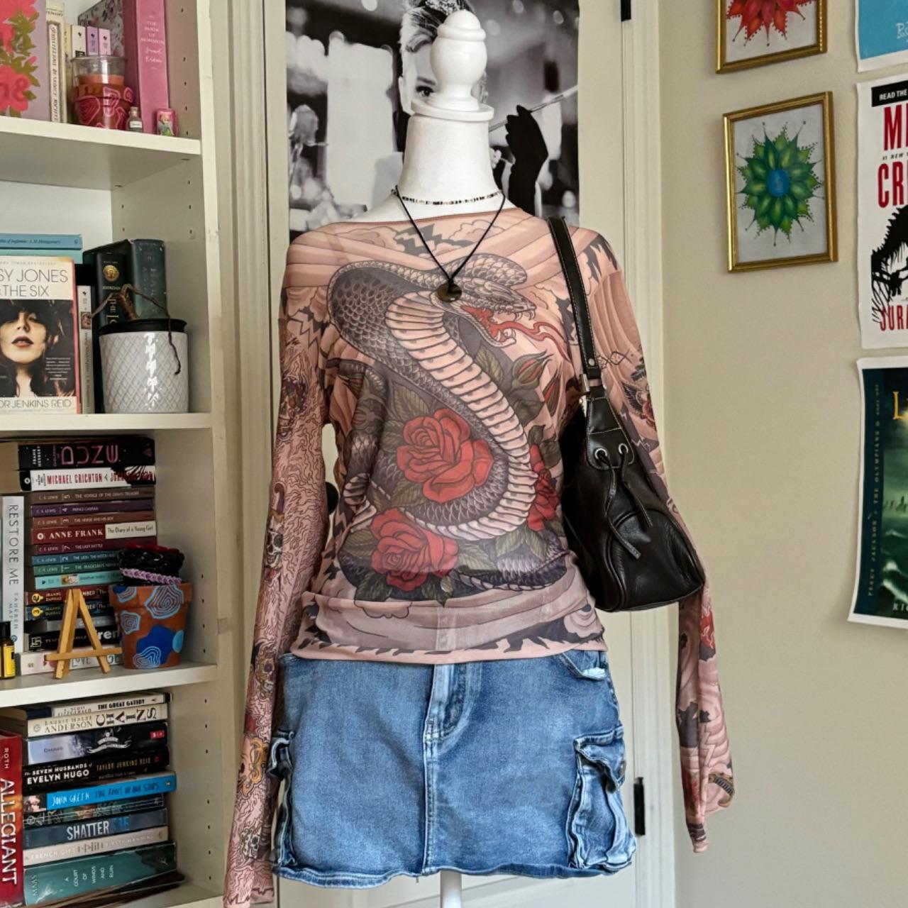 sheer top with the coolest graphic print - is in... - Depop