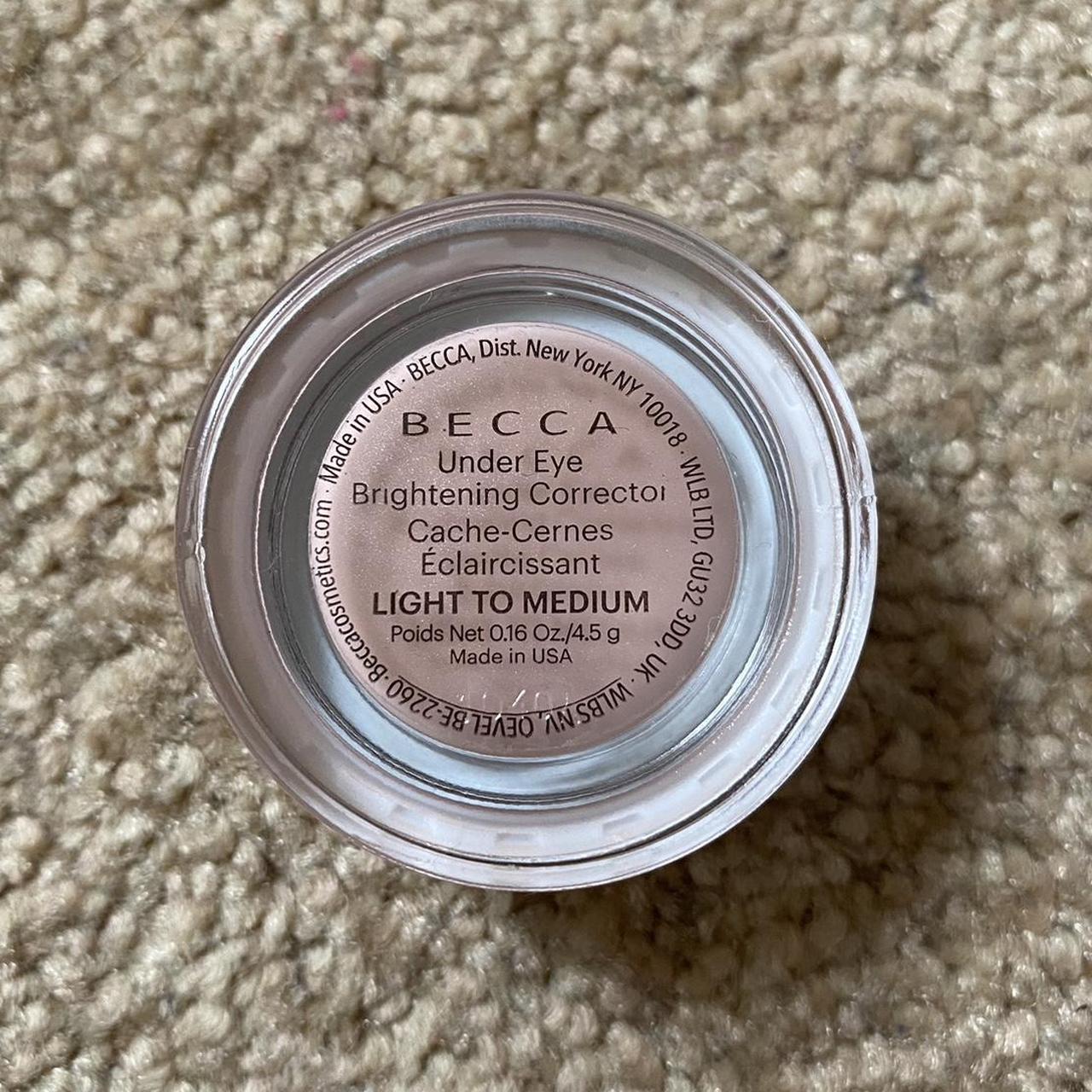 BECCA Under eye brightening corrector Light to... - Depop