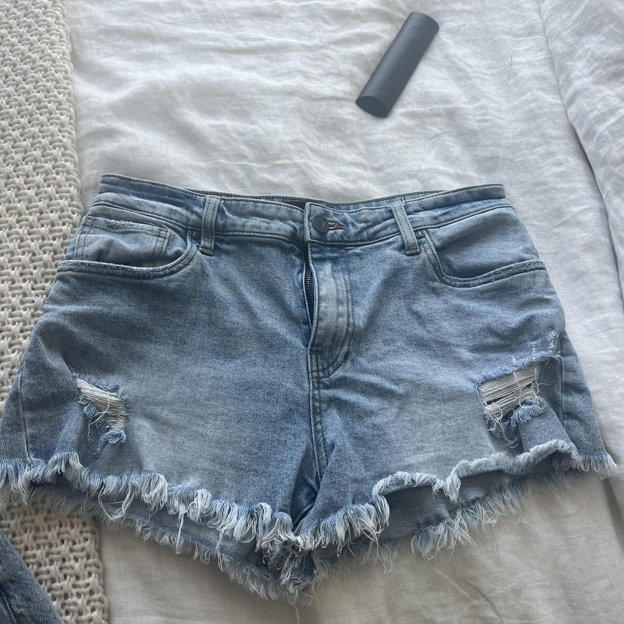Ripped blue jean shorts from Kut - Depop