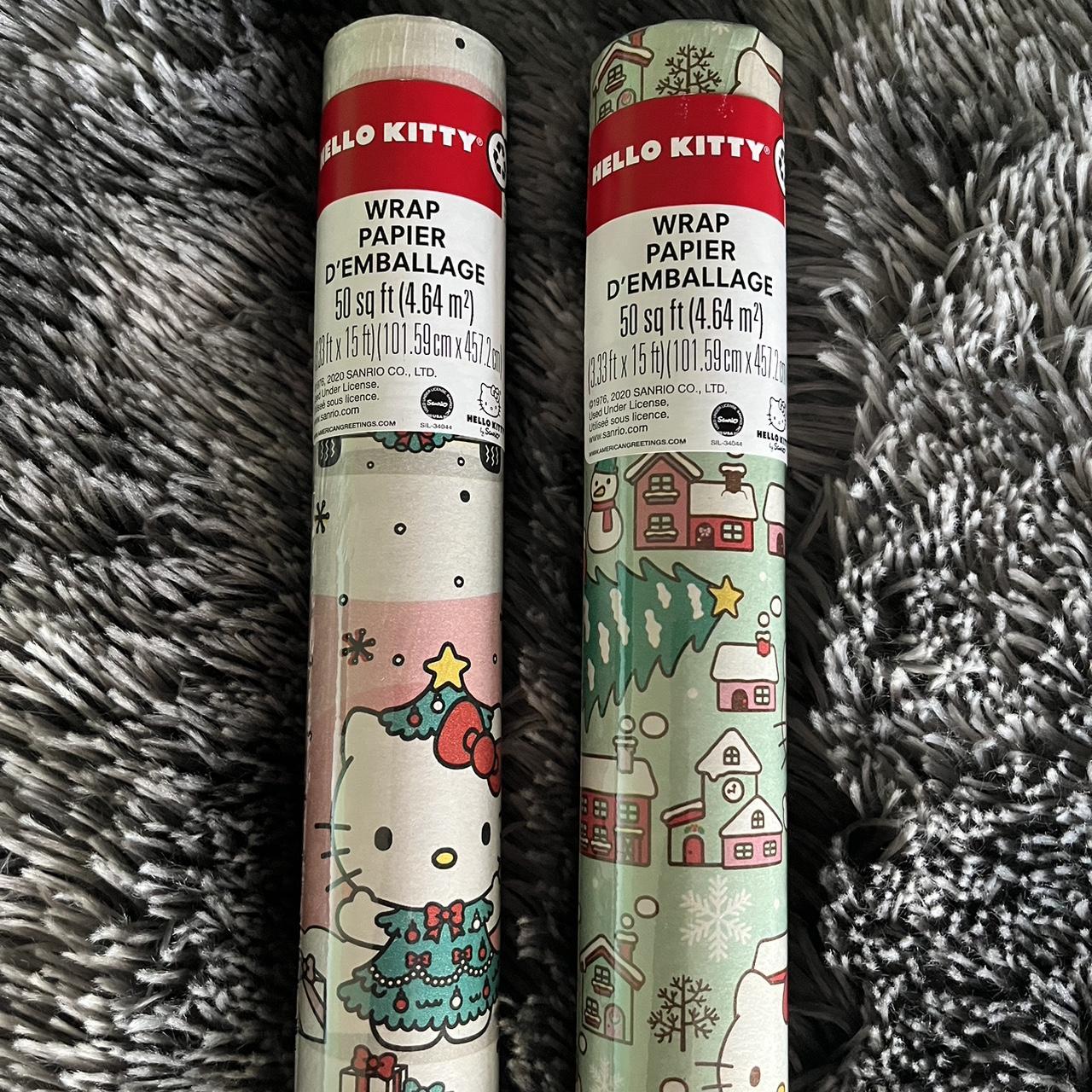 Two hello kitty Christmas wrapping paper, new in... - Depop
