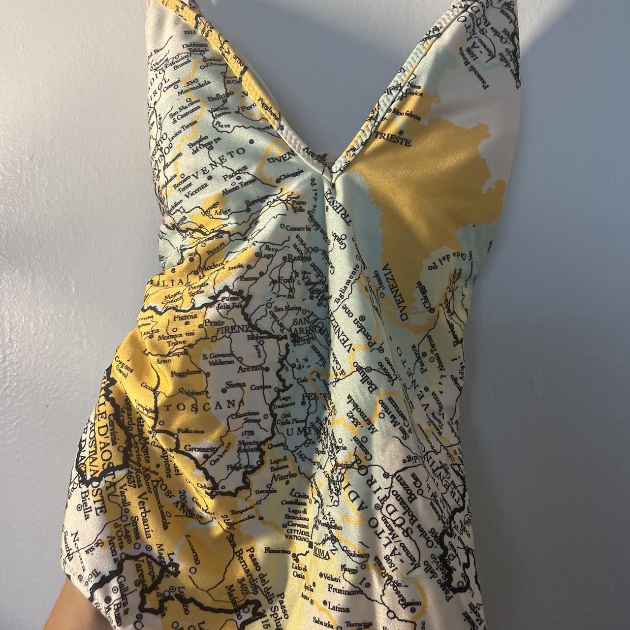 Cute, form-fitting one piece. Worn only once. Has a... - Depop