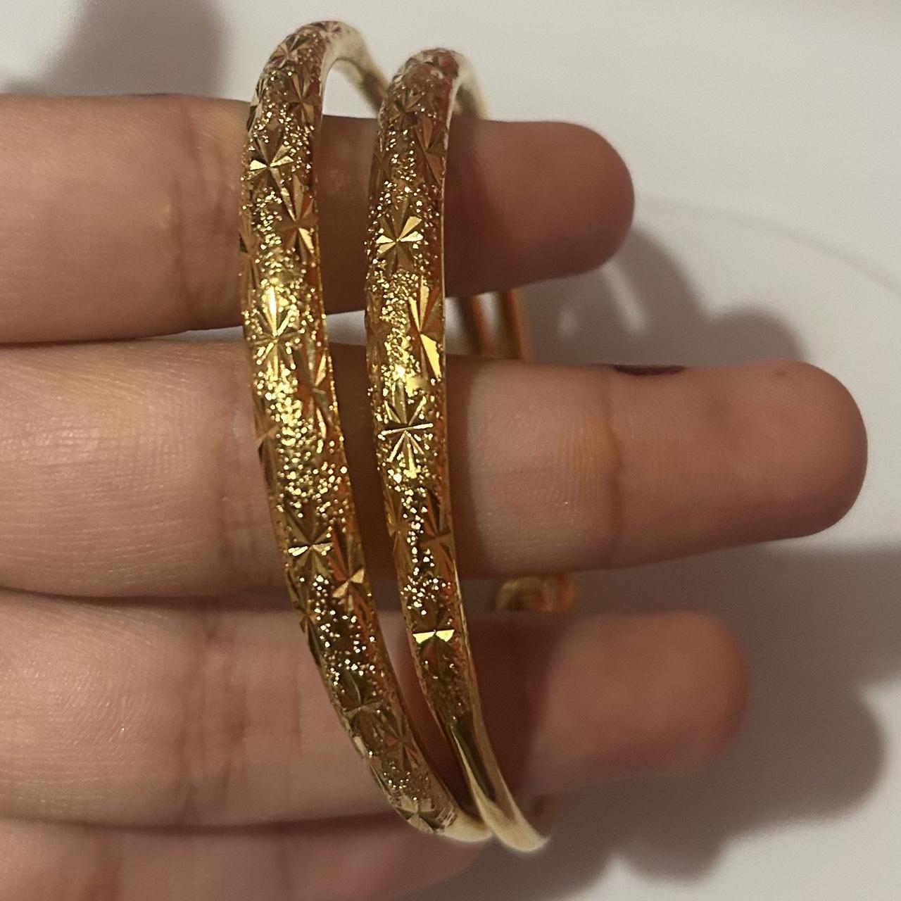 Textured heavy Golden Bangles set of 2 with a... - Depop