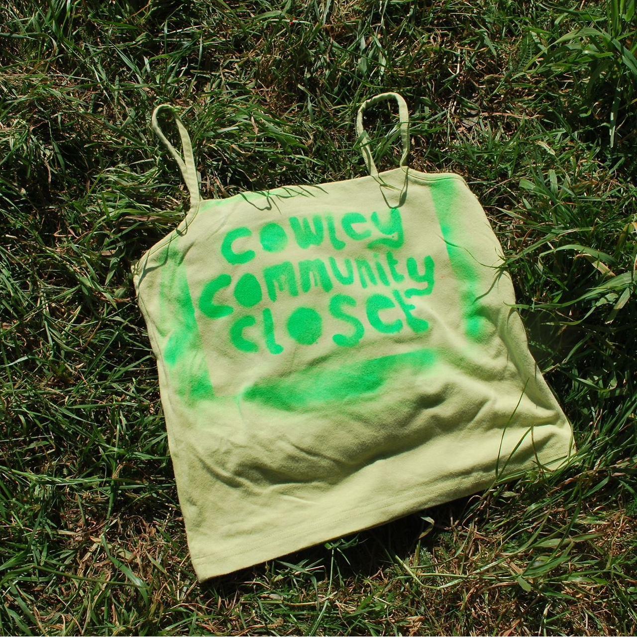 Green Cowley community closet tank top. With built... - Depop