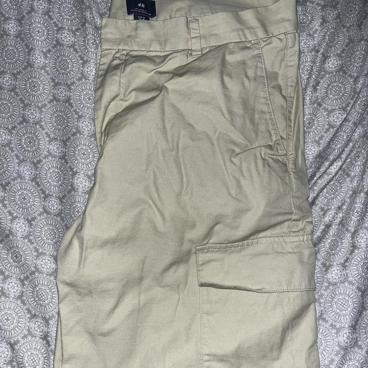 Light green cargo pts, they look beige but they're... - Depop