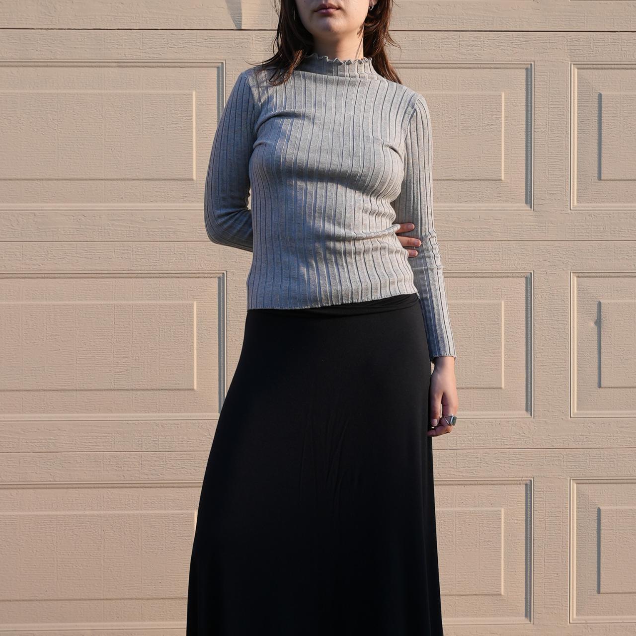 Ribbed, body-hugging turtleneck. Watermelon hem. - Depop