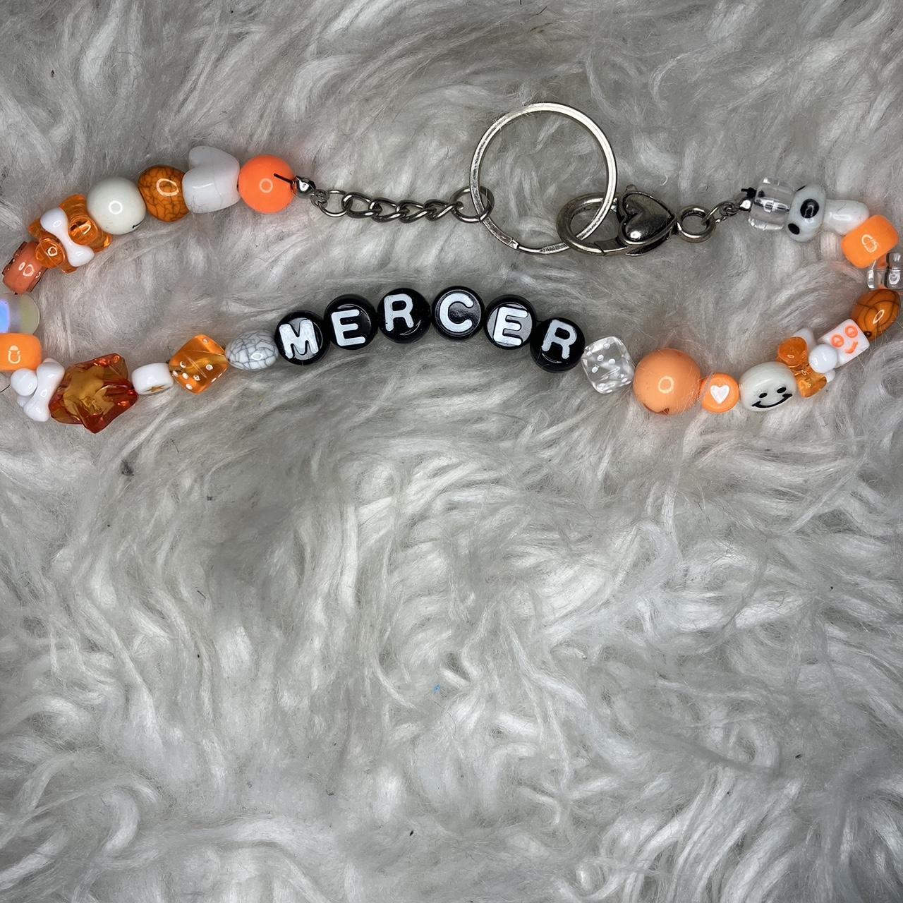 This is a Mercer keychain It’s light weight and... - Depop