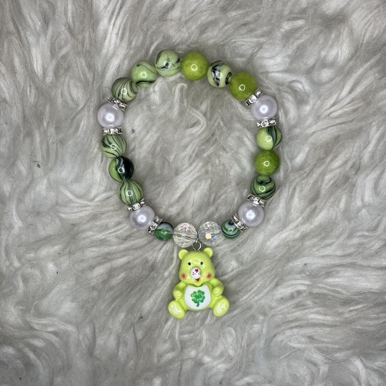 This is a beaded bracelet It’s got a carebear as a... - Depop