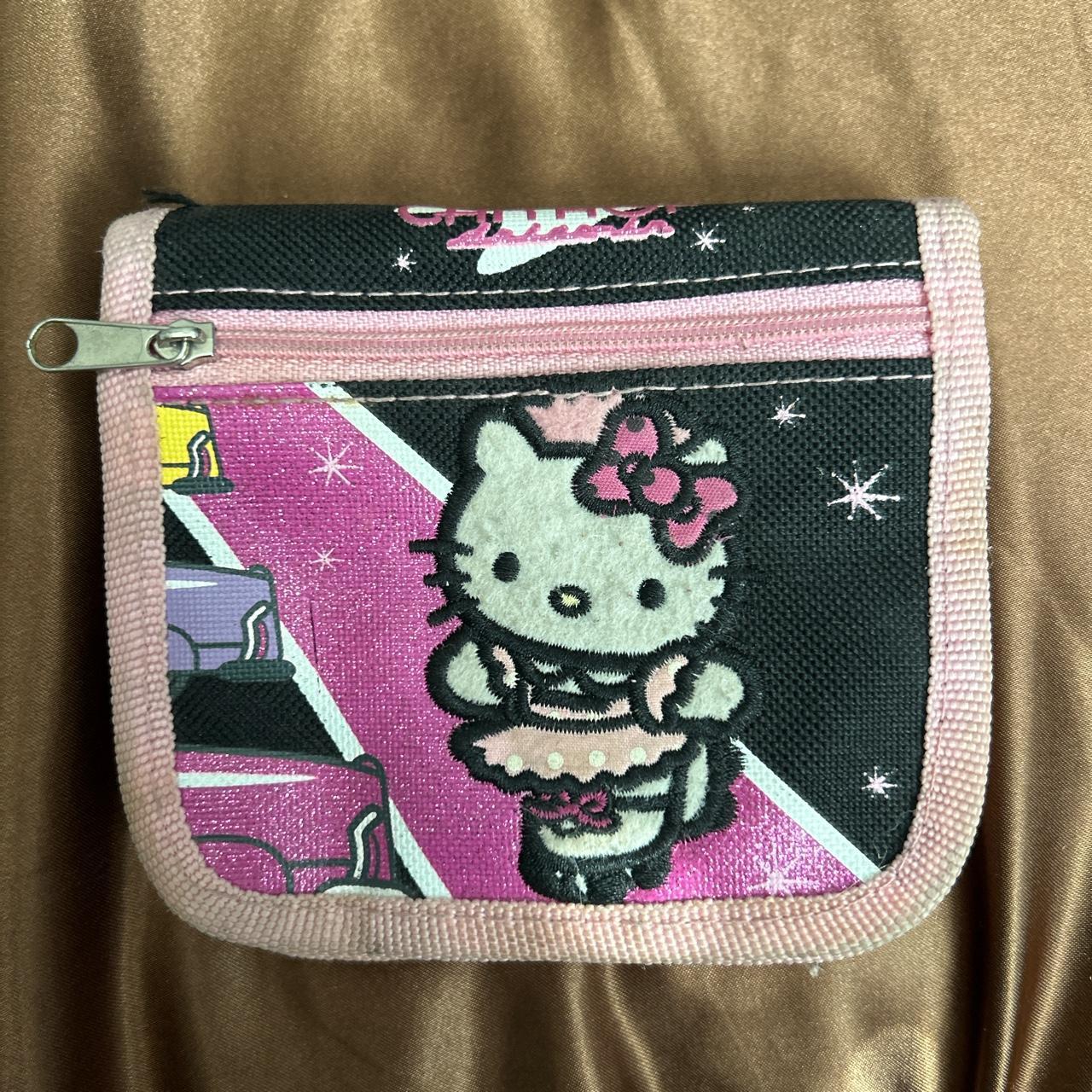 Hello kitty wallet in very good condition just a... - Depop