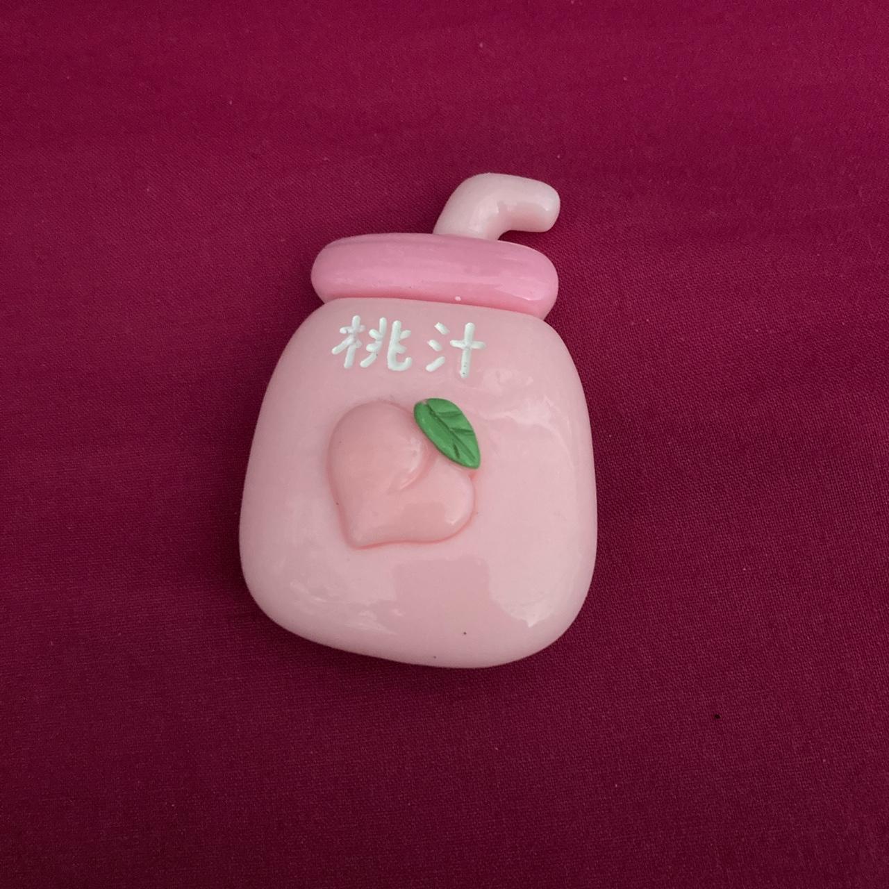Cute peach milk pop socket. Sticks on the back of... - Depop