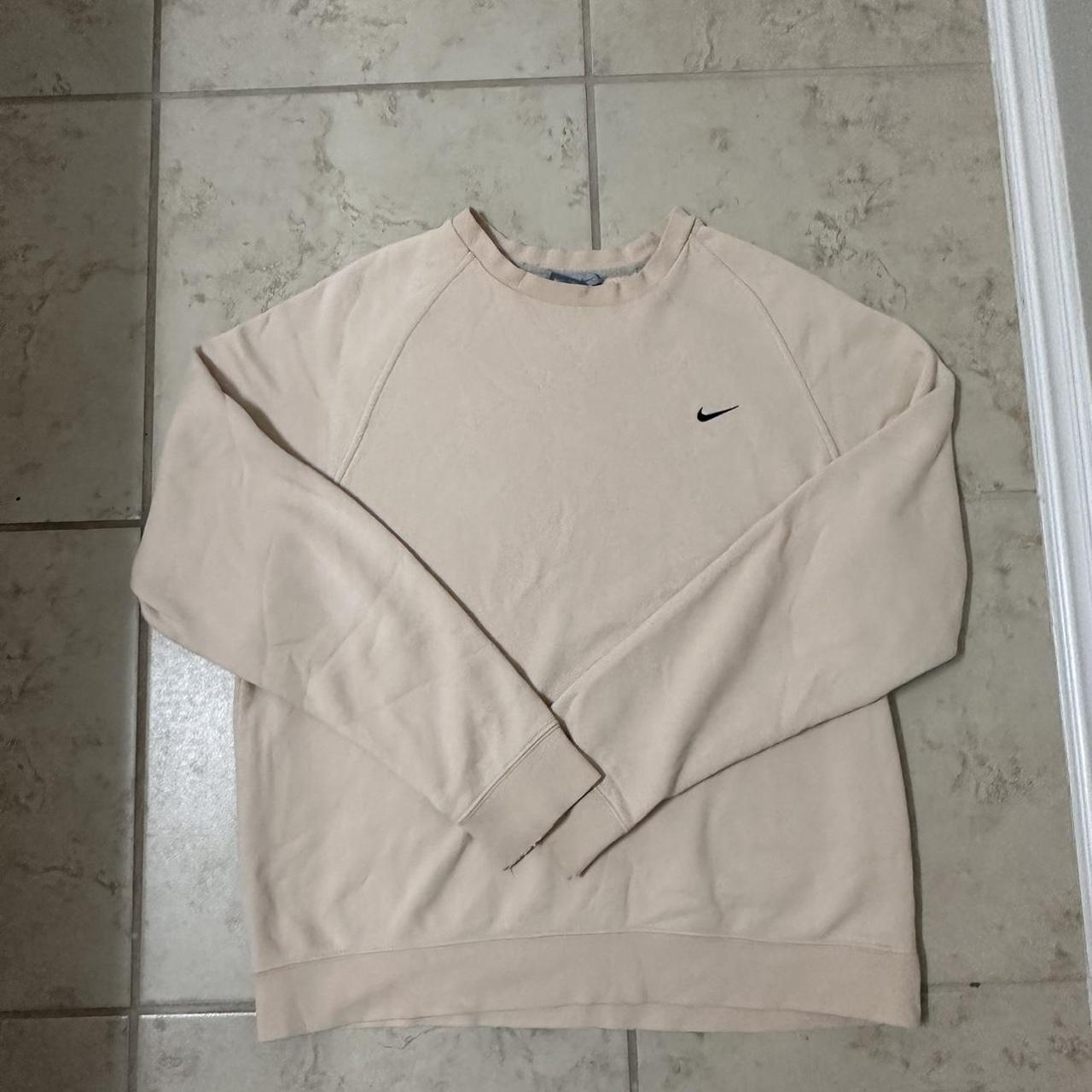 Cream Nike swoosh sweatshirt size large. Has some... - Depop