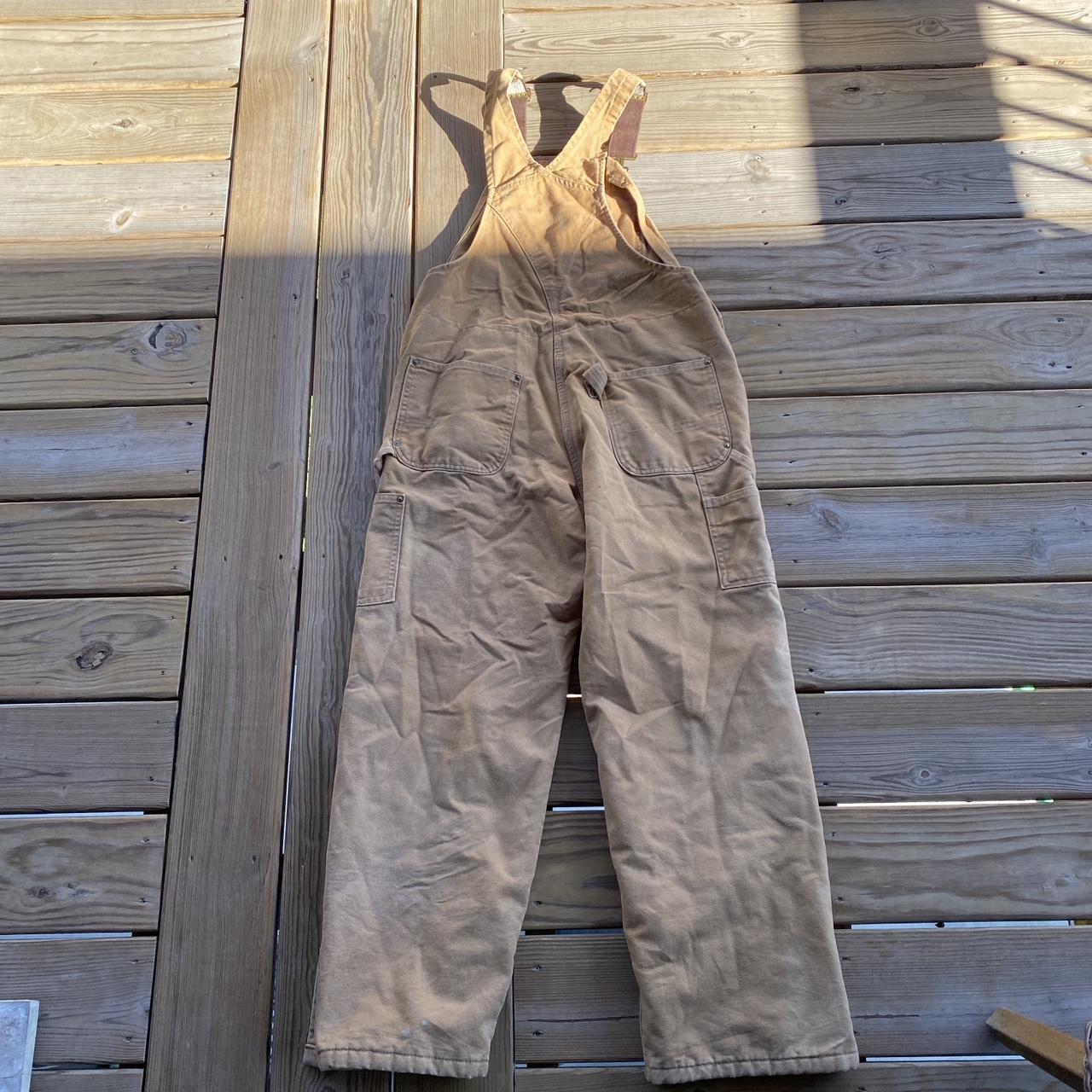 Tan Carhartt overalls. Tagged 36x30. Zipper missing... - Depop