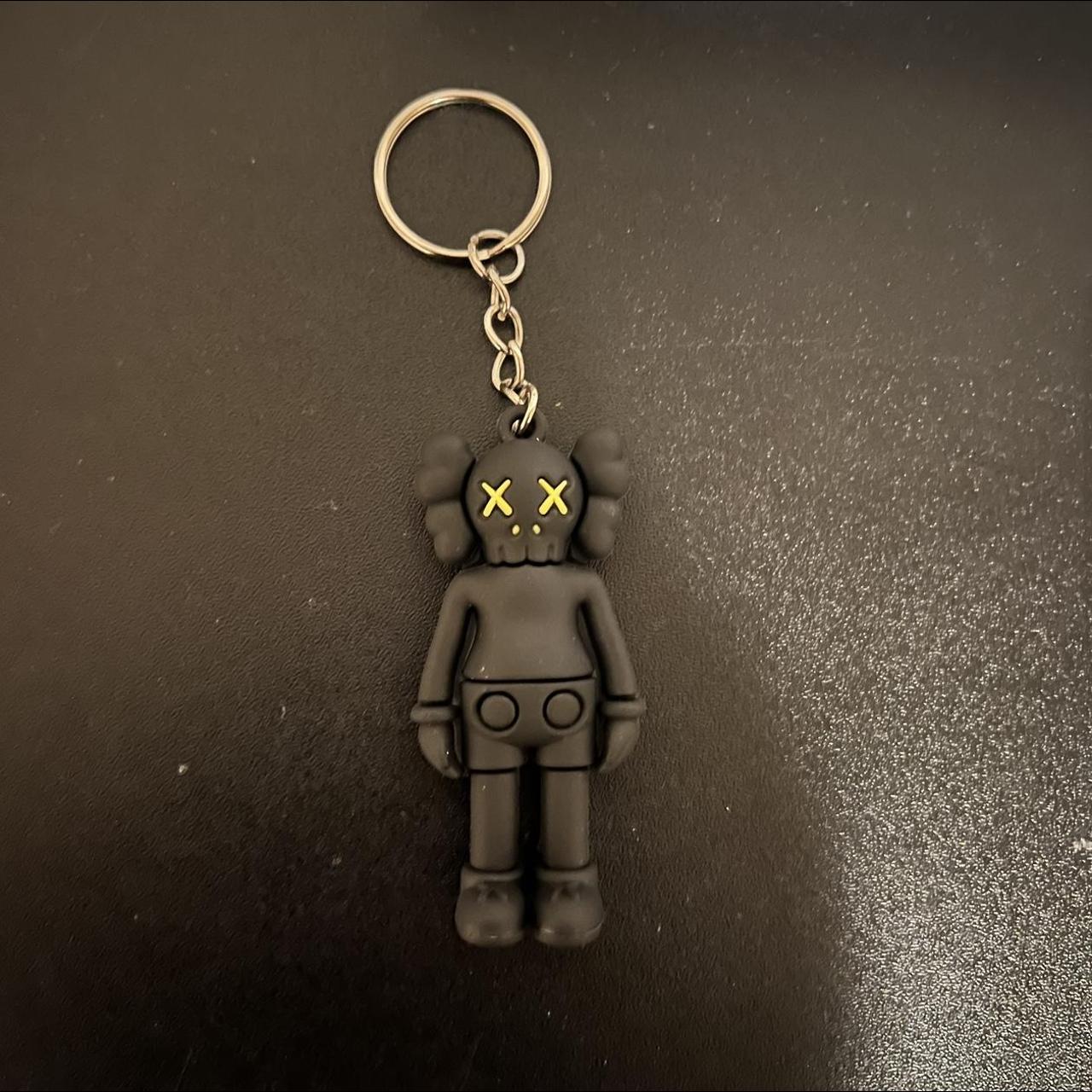 Black Kaws keychain unused open for negotiations... - Depop