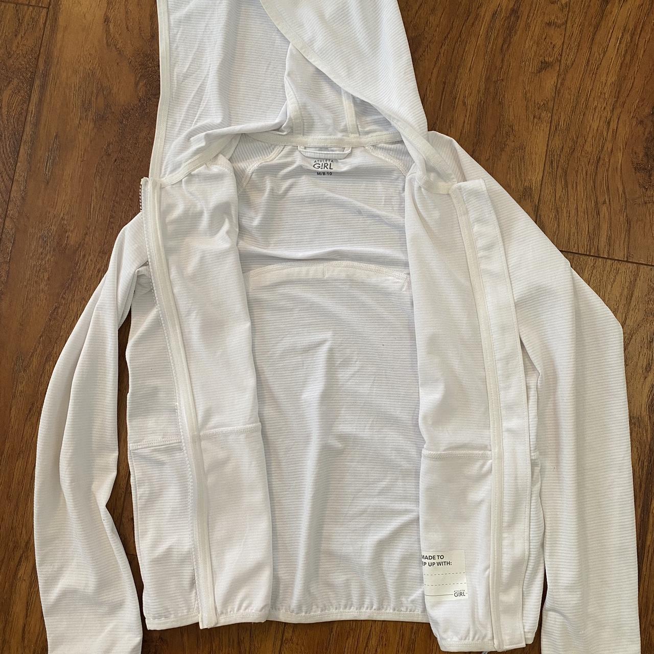 Athleta Girl white zip up. Size m (8-10 years) - Depop