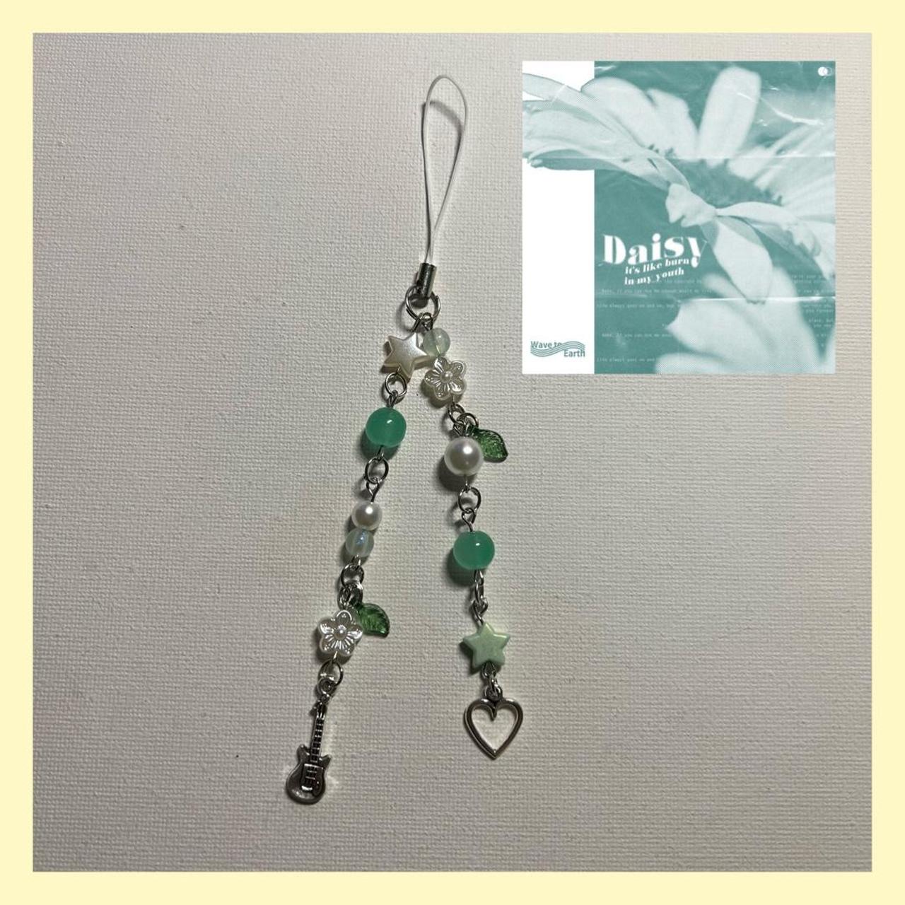 wave to earth ‘daisy’ keychain charm... - Depop