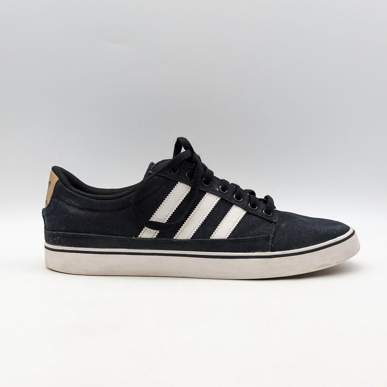 Adidas navy canvas trainers in men's size 11... - Depop
