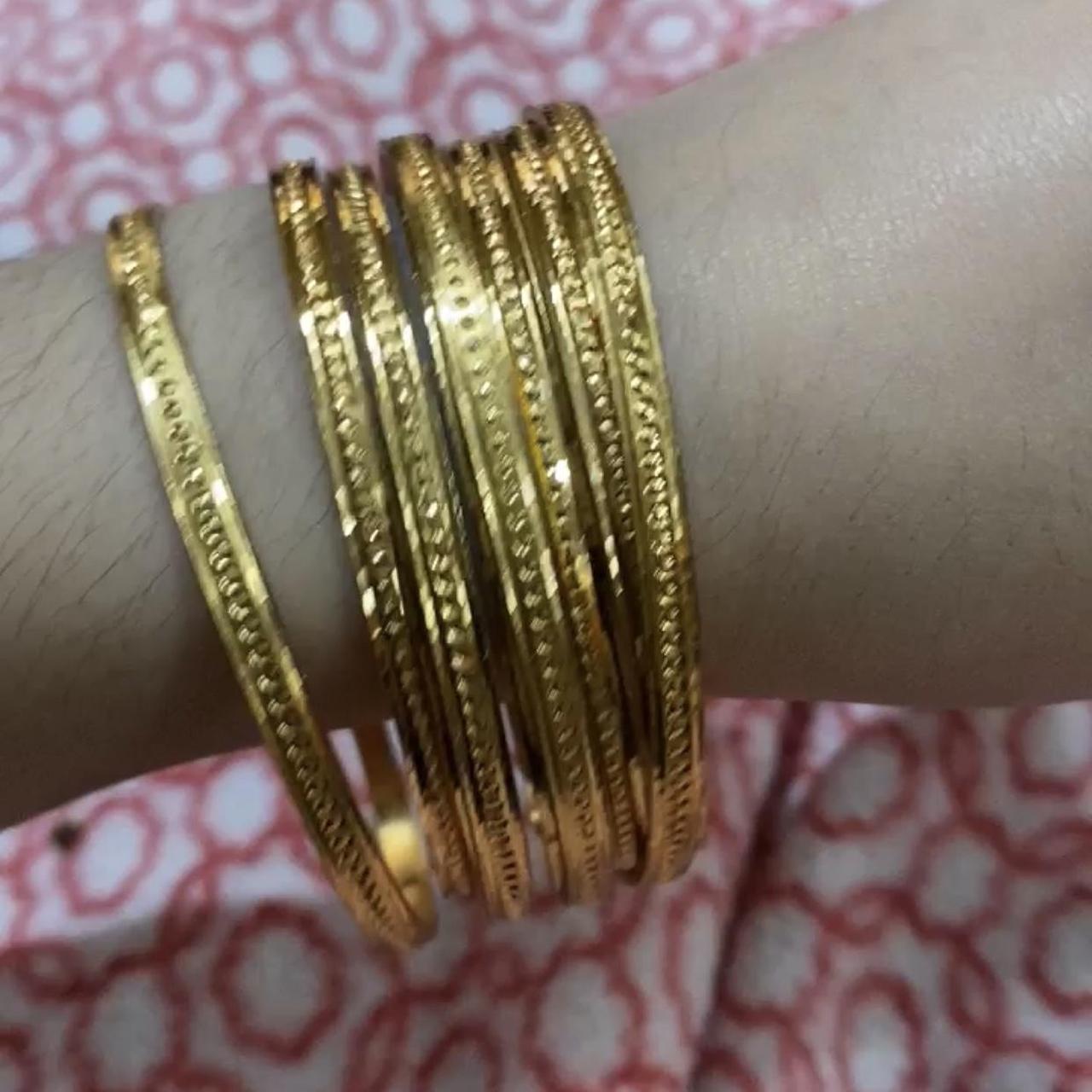 Gold Toned bangle set- Indian style Gold color... - Depop