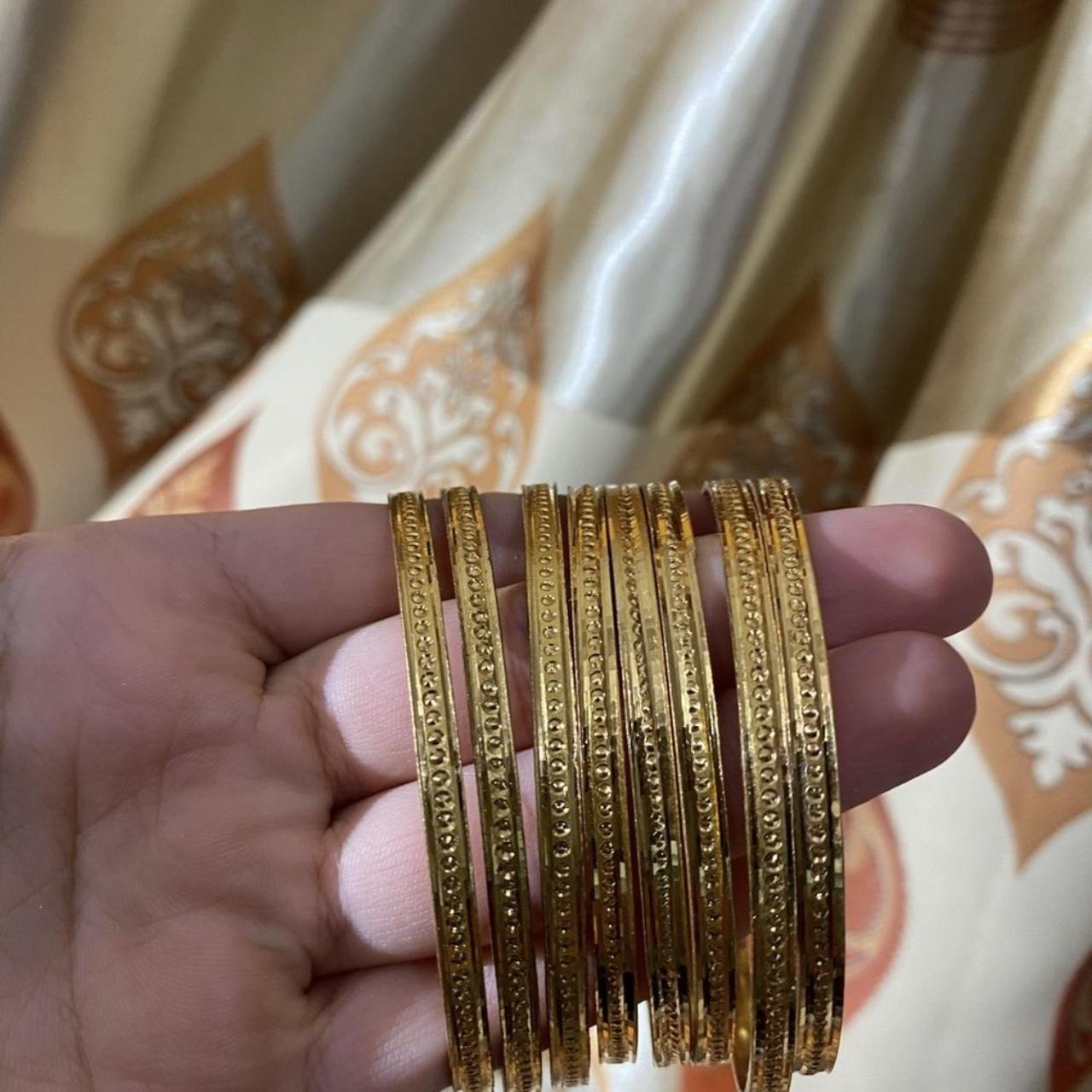 Gold Toned bangle set- Indian style Gold color... - Depop