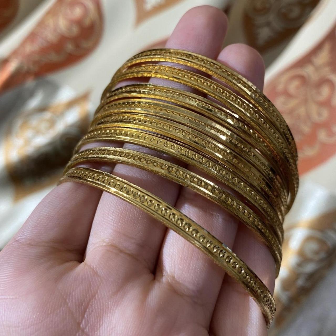 Gold Toned bangle set- Indian style Gold color... - Depop