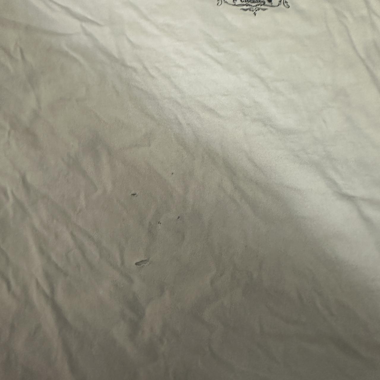 vintage graphic t shirt, no size tag but fits like a... - Depop