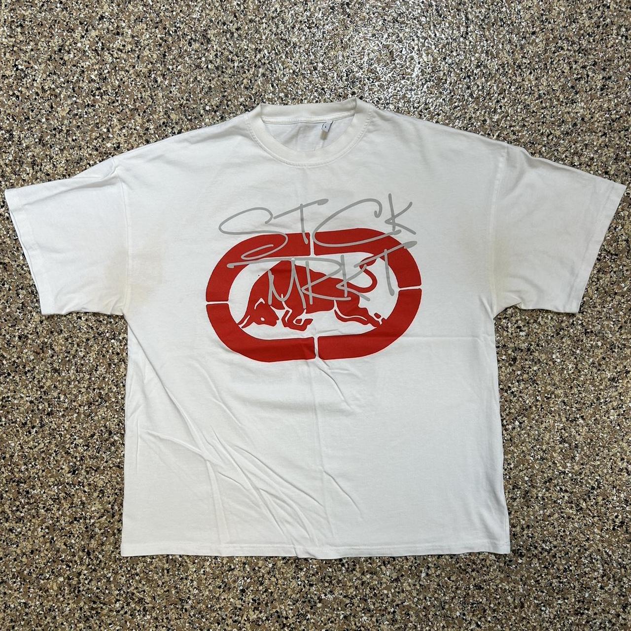 Ecko Unltd. Stock Market white tee w/ twin towers... - Depop