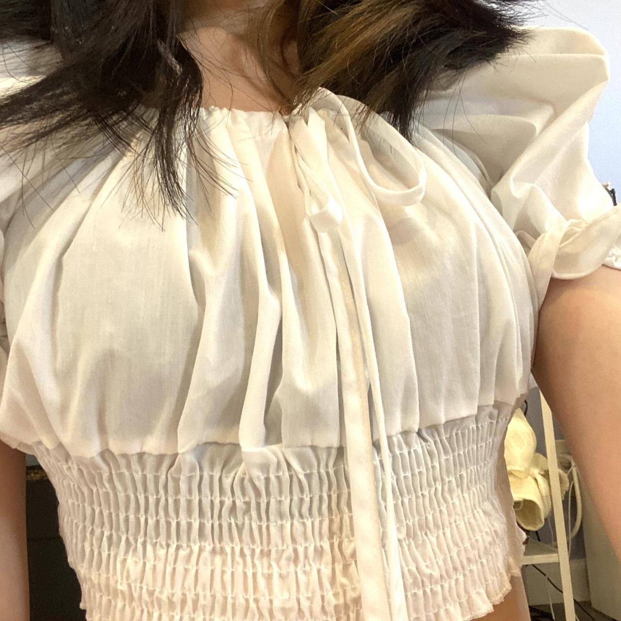 really cute white top! it is cropped! no noticeable... - Depop