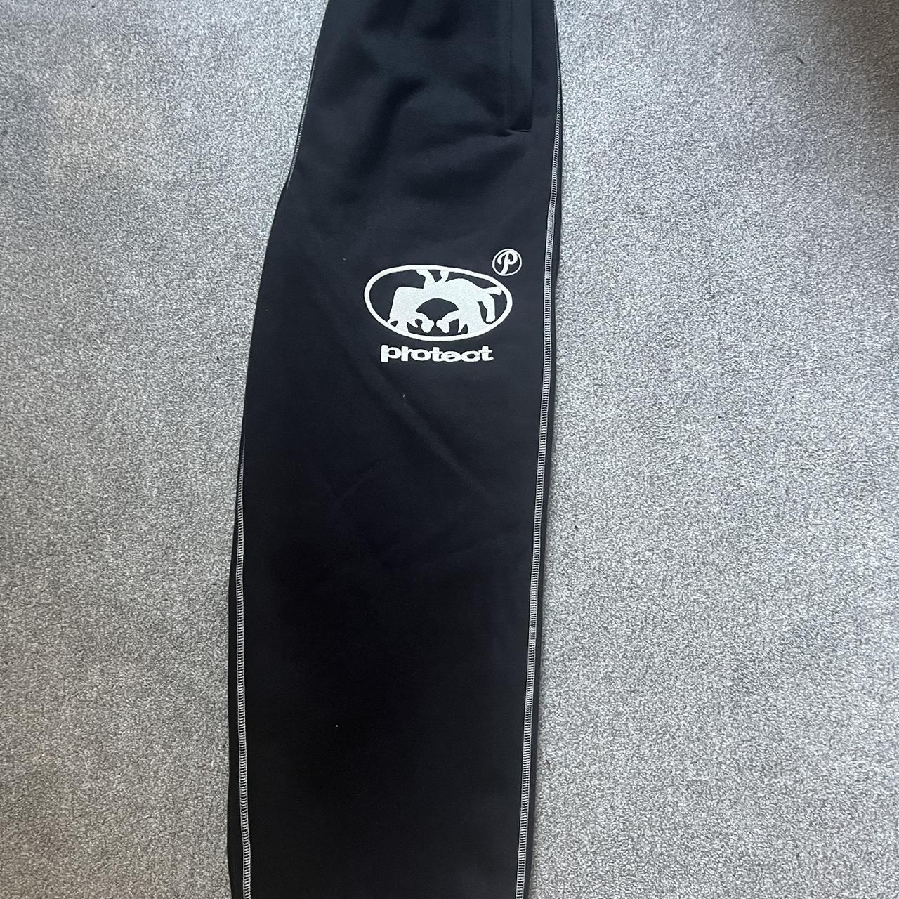 Protect london black joggers size medium worn once - Depop