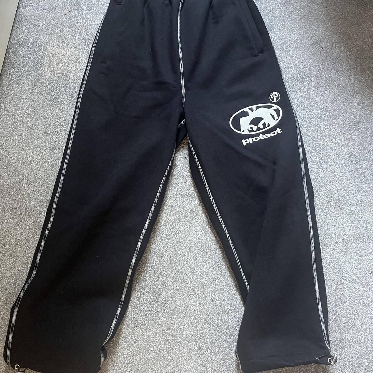 Protect london black joggers size medium worn once - Depop