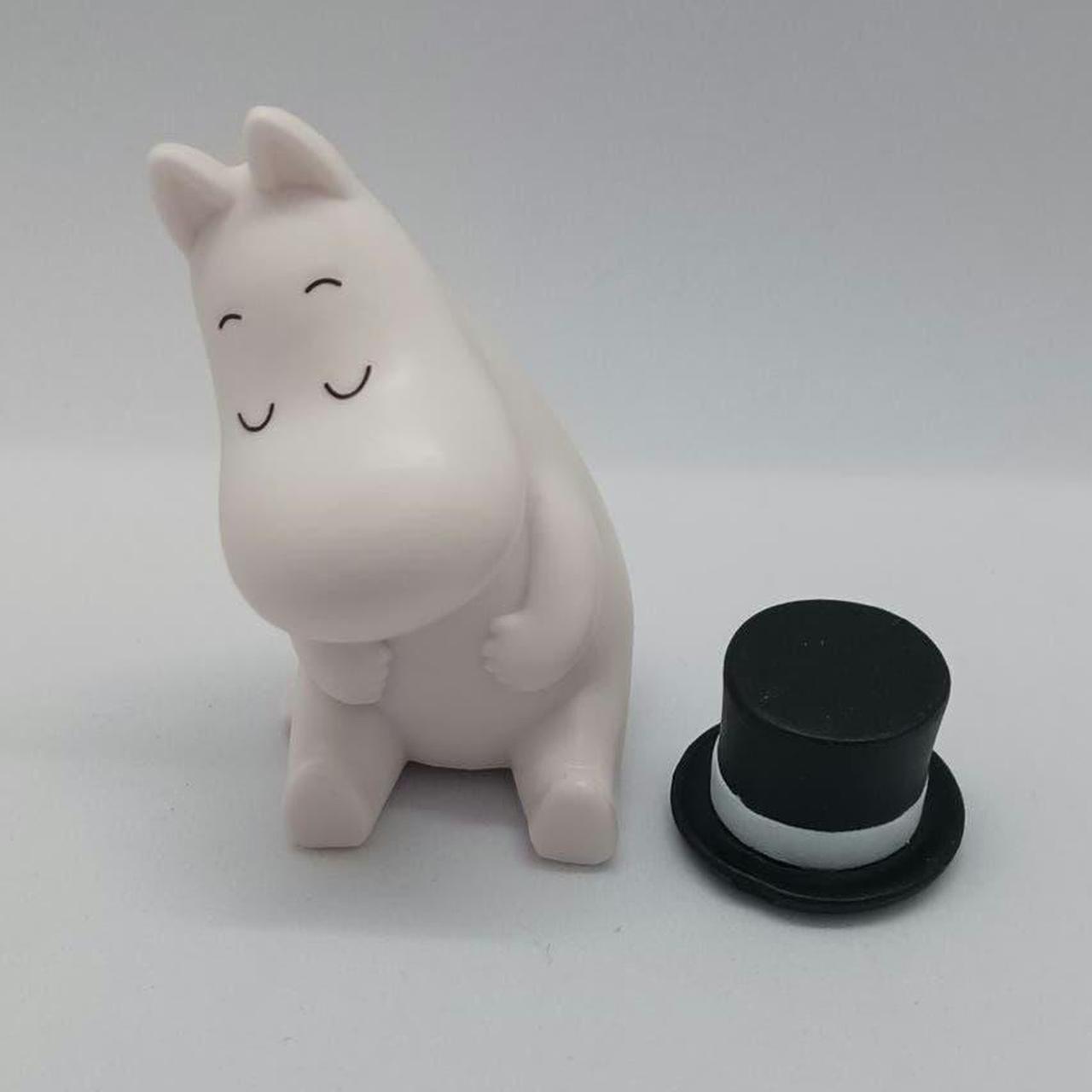 Moomin sleeping figurine with black hat. It comes in... - Depop