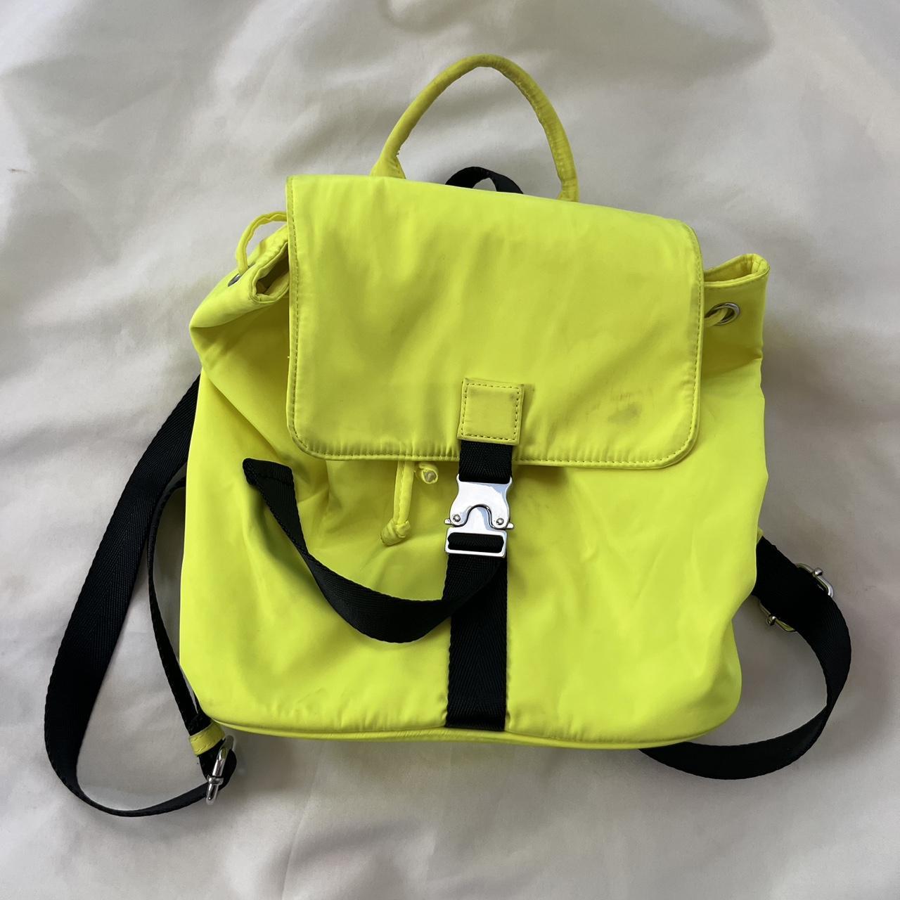Mini neon yellow backpack Small dirt mark - Depop