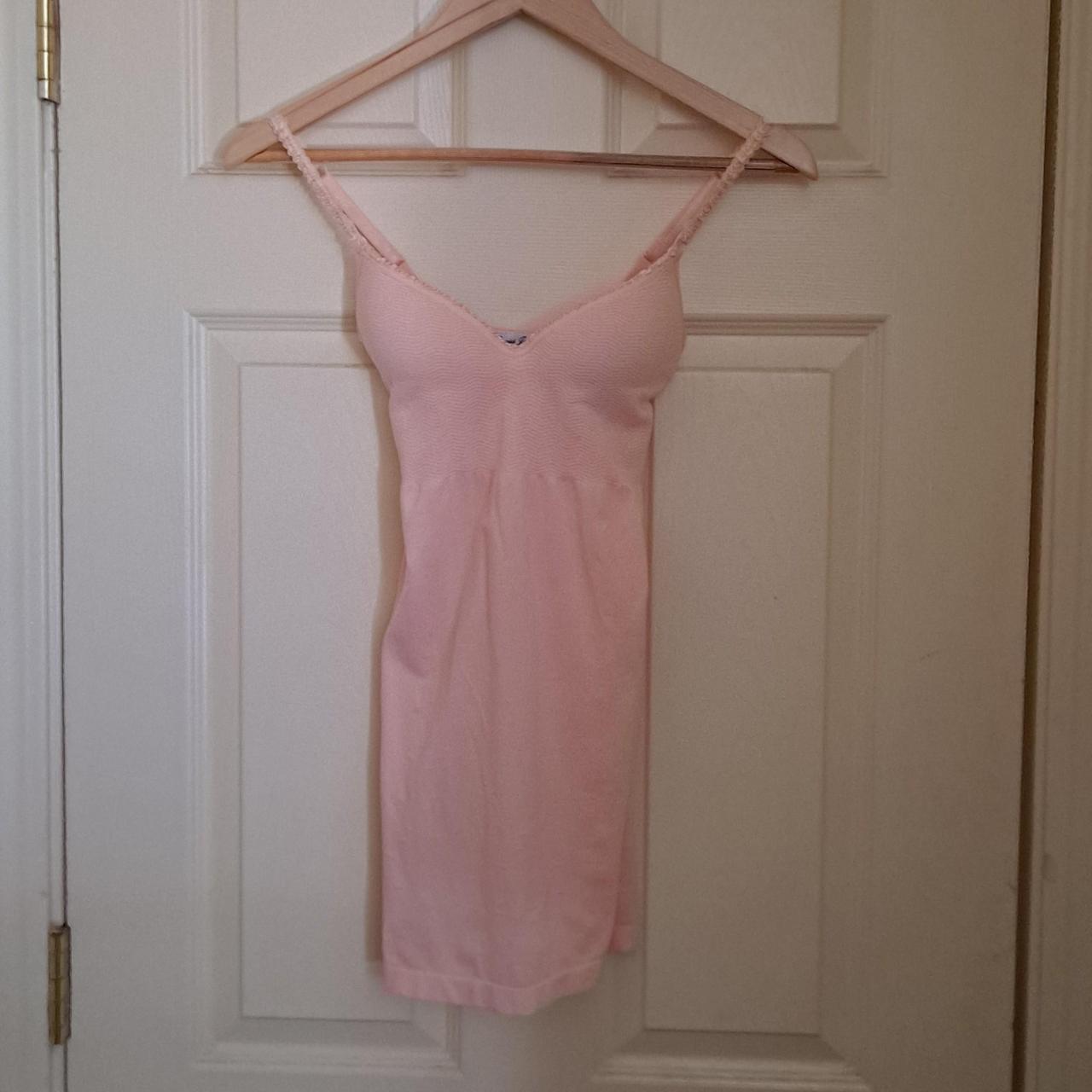 This is a baby doll stretch built in bra with... - Depop
