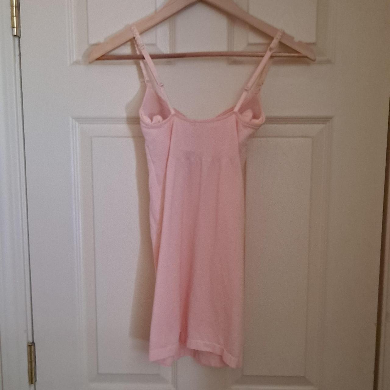 This is a baby doll stretch built in bra with... - Depop