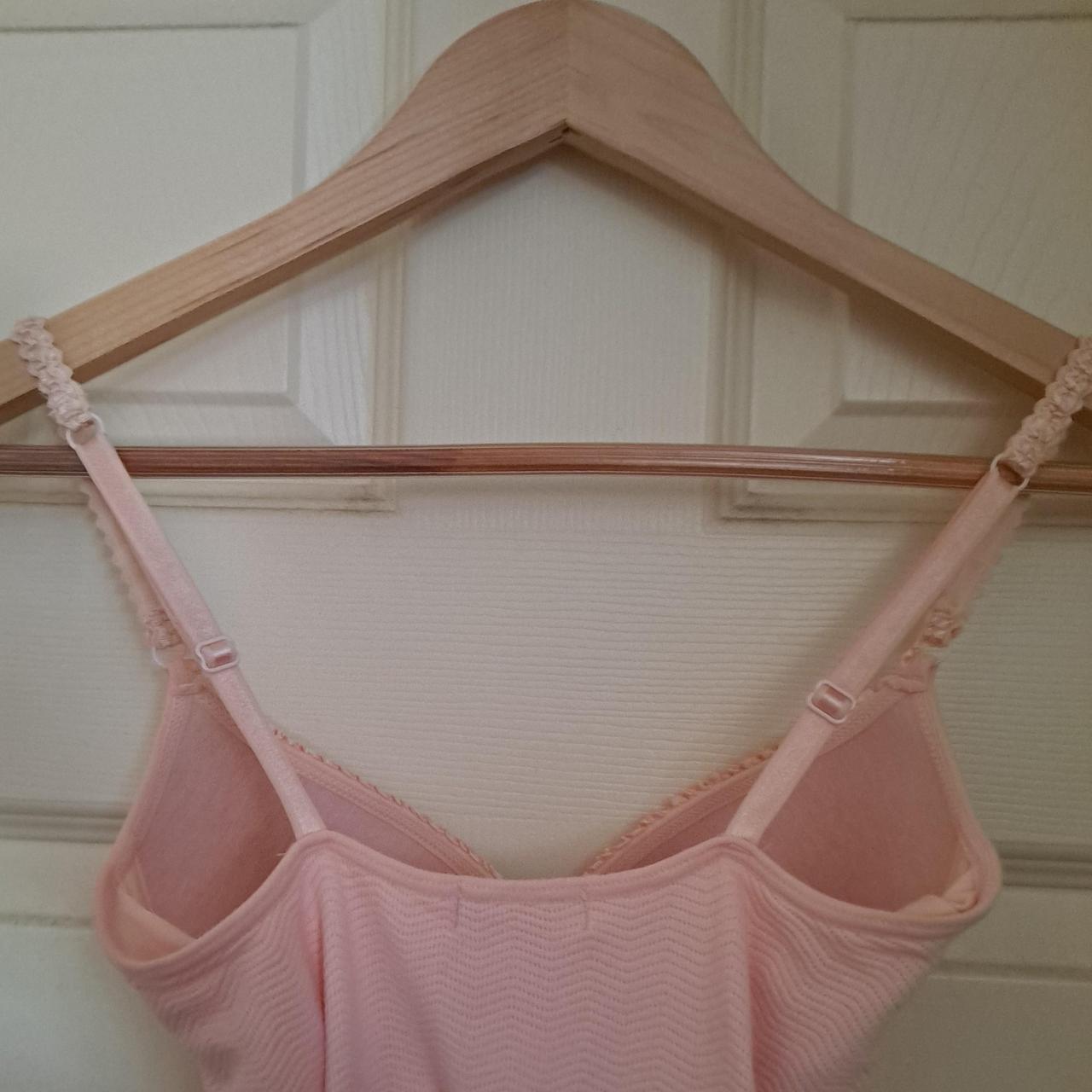 This is a baby doll stretch built in bra with... - Depop