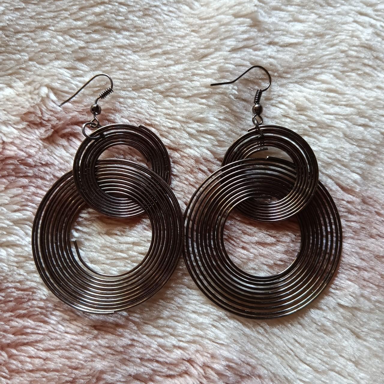 Trippy spiral hoop earrings #spiral #hoops... - Depop