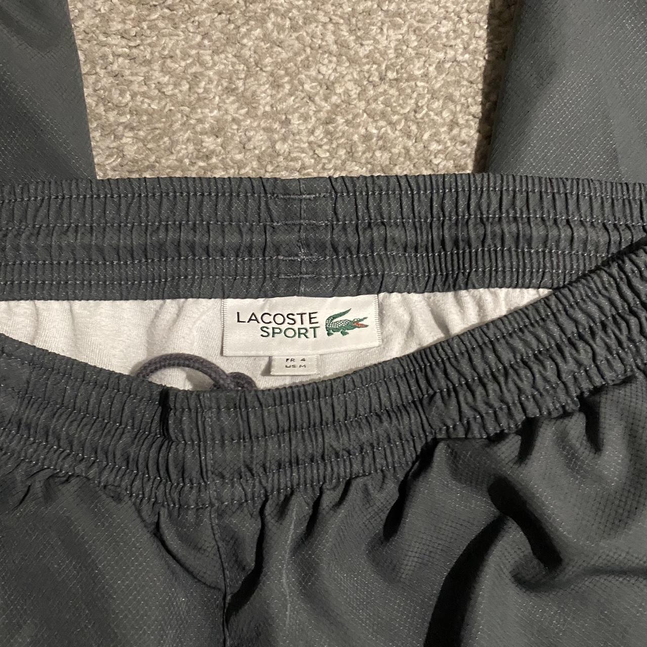 grey Lacoste tracksuit bottoms hard to get mint... - Depop