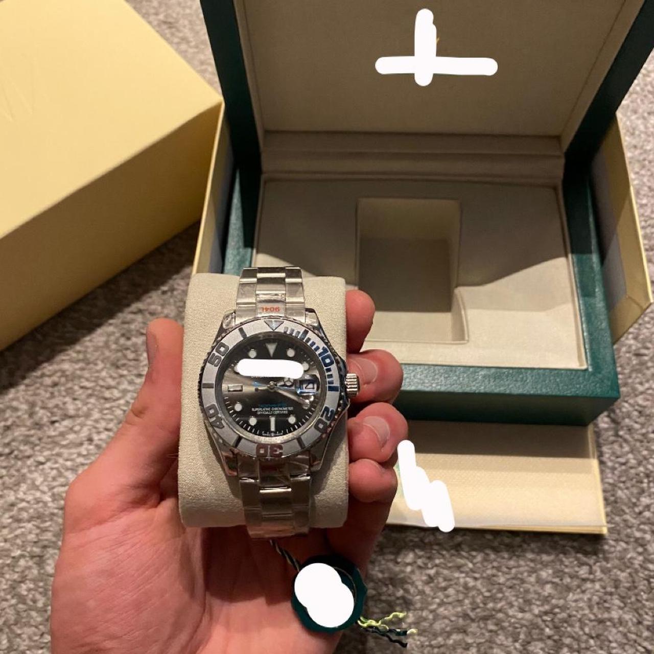 Men’s Silver And Grey With Tints Of Light Blue Watch... - Depop