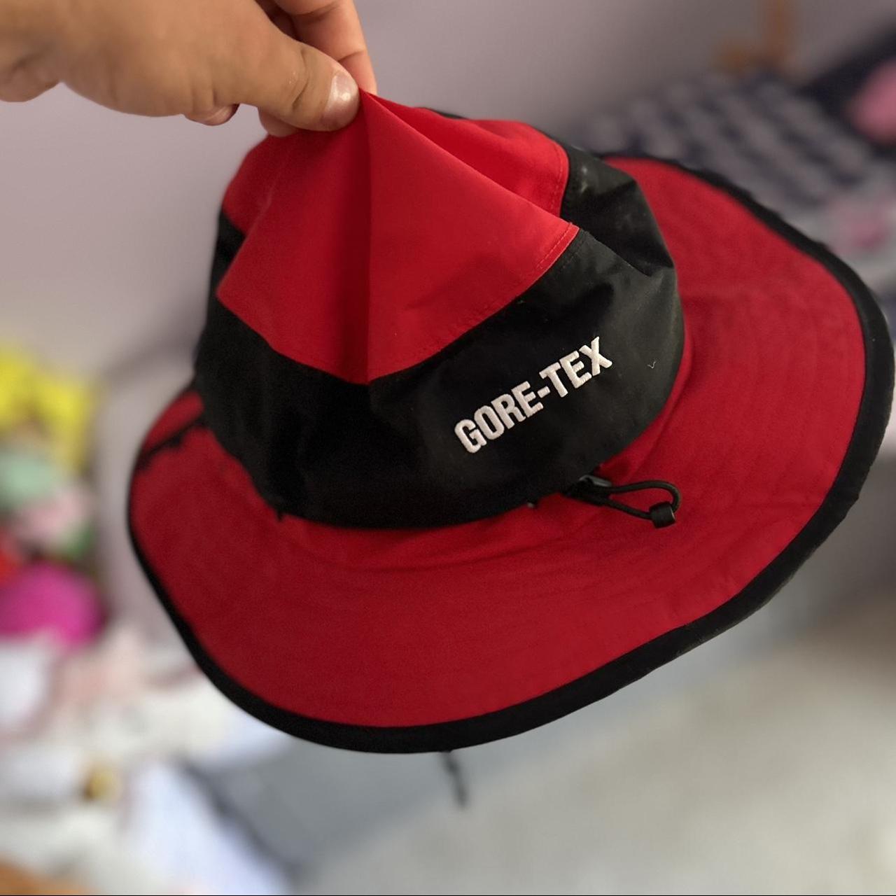 North face x supreme red bucket hat size S/M... - Depop